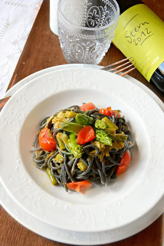 Black spaghetti Marinara with cuttlefish ink, salted capers and sweet ...